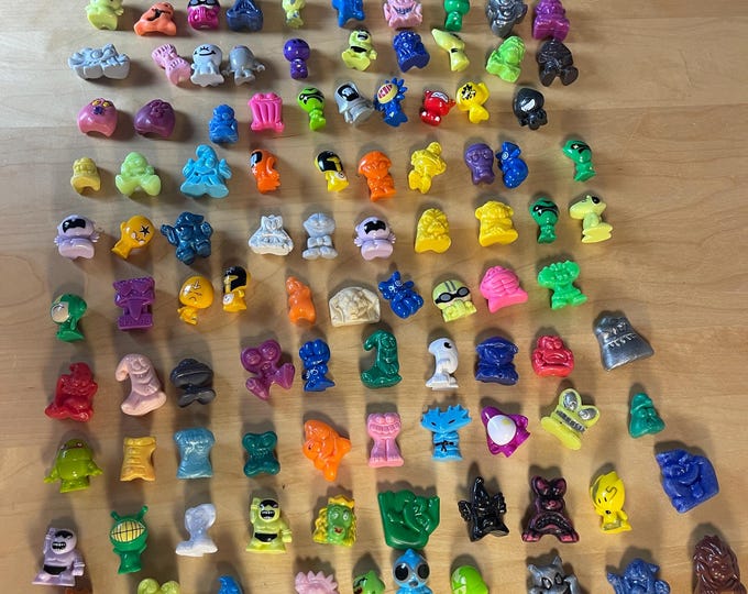 10 zufällig ausgewählte Dracco Heads Crazy Bones Gogos Sammlung ...