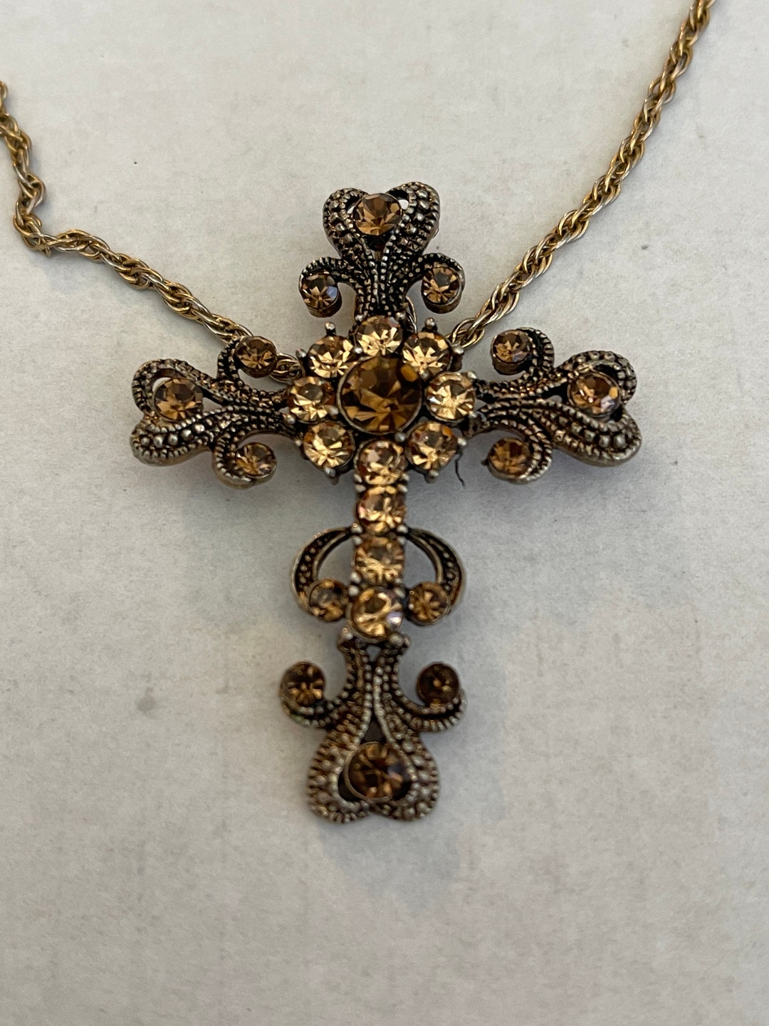 A Very Beautiful Necklace / a Sparkling Cross Fine Golden Colors on the ...