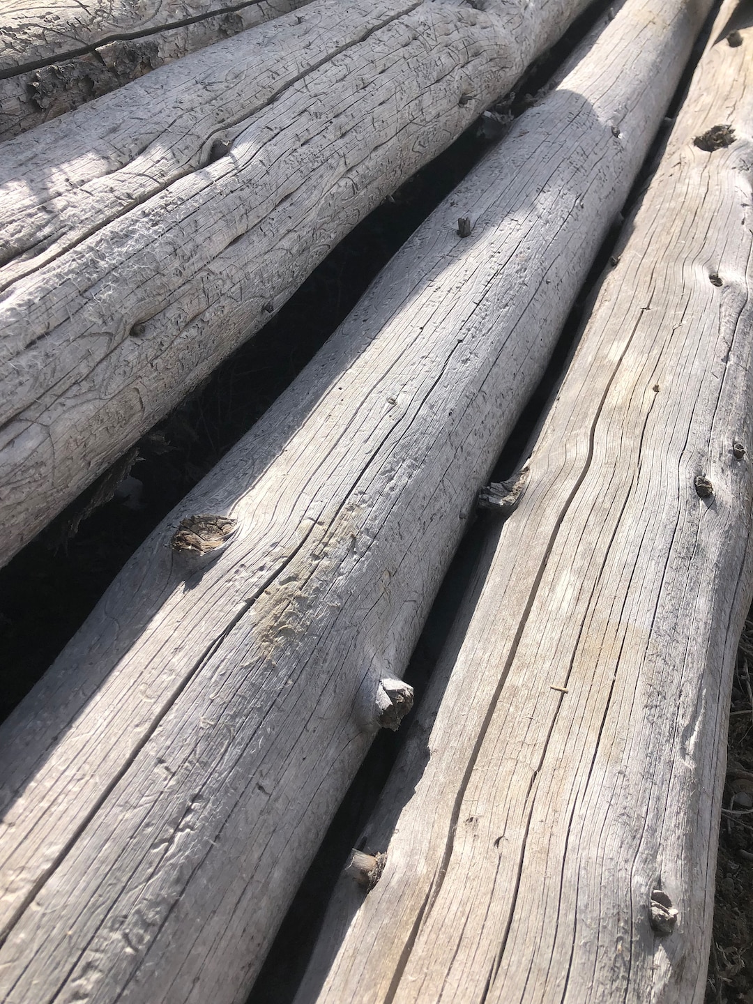 Logs Poles and Posts of Reclaimed Weathered Antique Grey Old Cracking ...