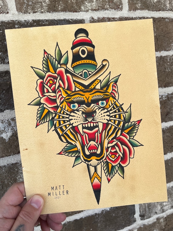 Traditional Tiger And Dagger Tattoo