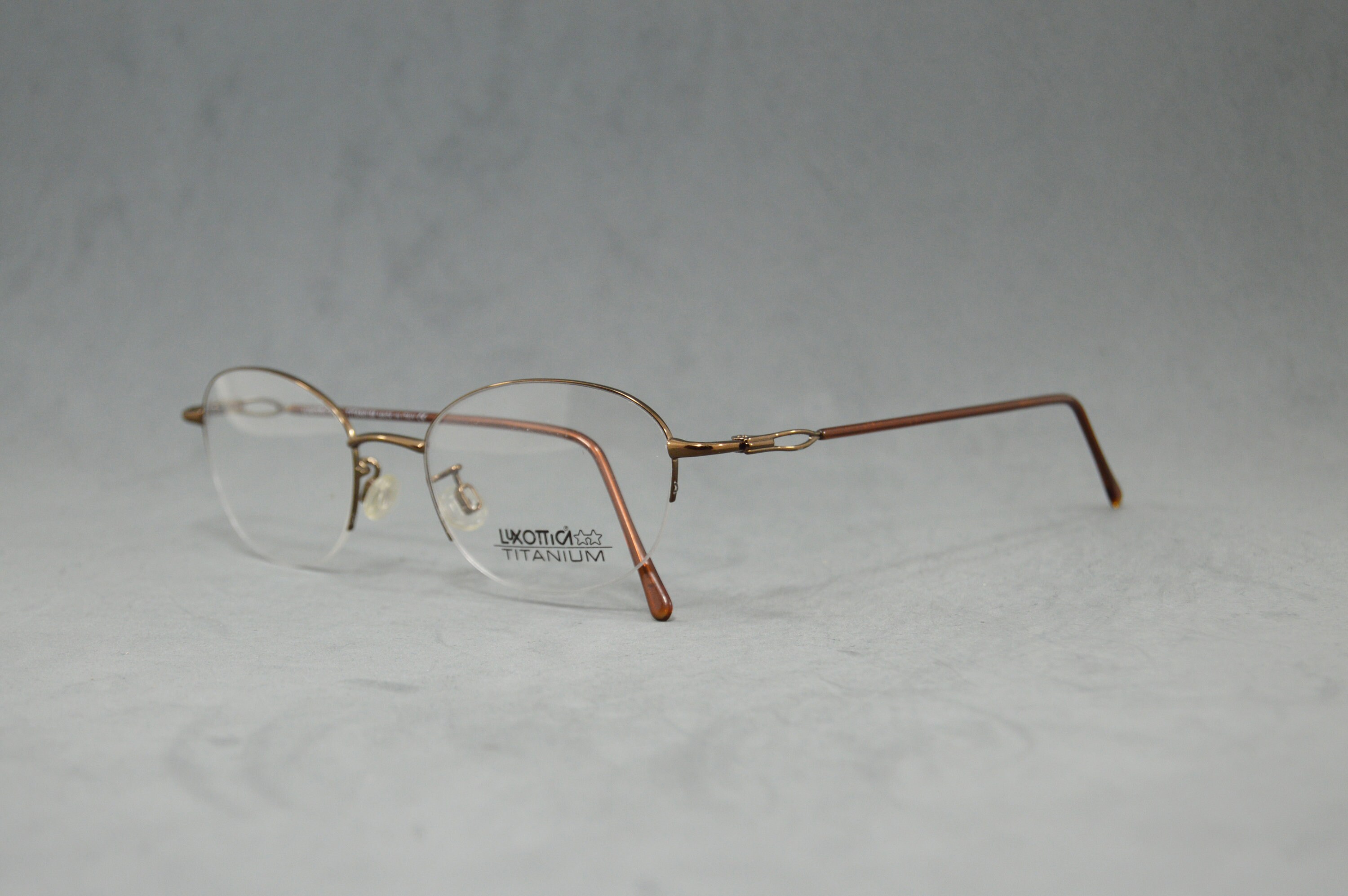 Vintage Eyeglasses LUXOTTICA Titanium NOS Unworn Classic Regular Size ...