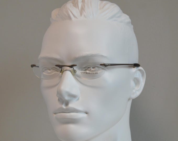 OAKLEY. Original & Genuine Vintage Rimless Titanium Eyeglasses. Model ...