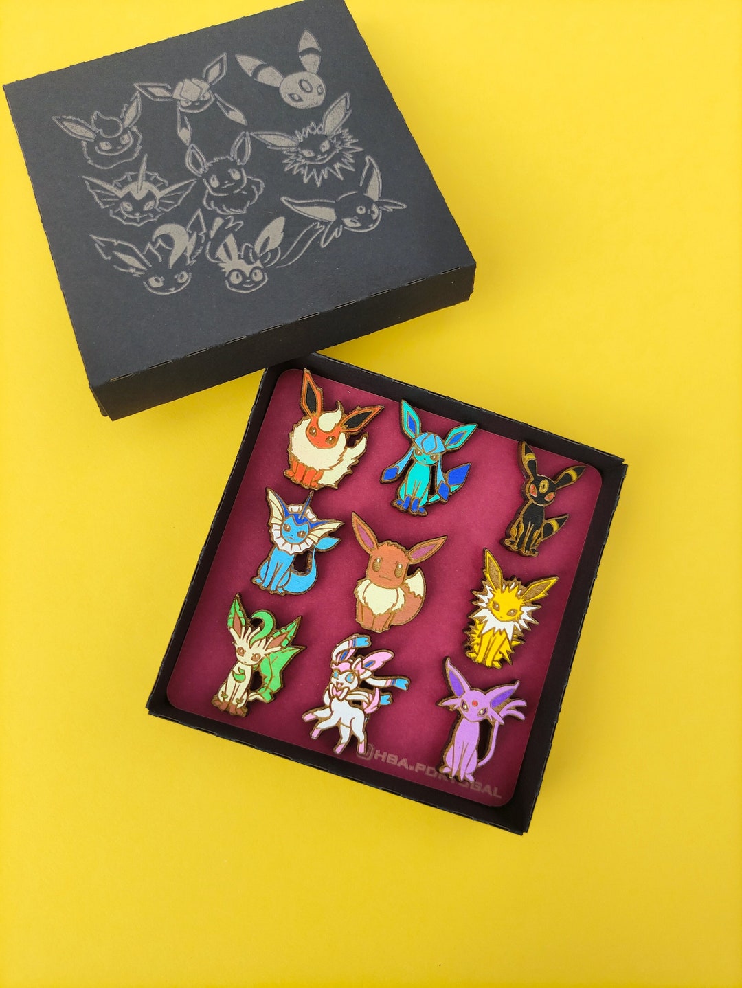 Set of Wooden Pokémon Pins, Evolutions of Eevee, Vaporeon, Jolteon ...