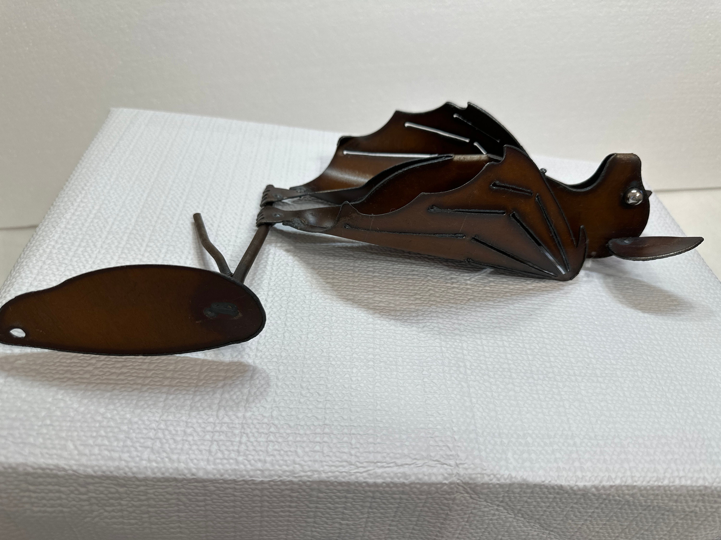 Metal Bat Hanging From a Limb Hand Made From Metal and Look at Those ...