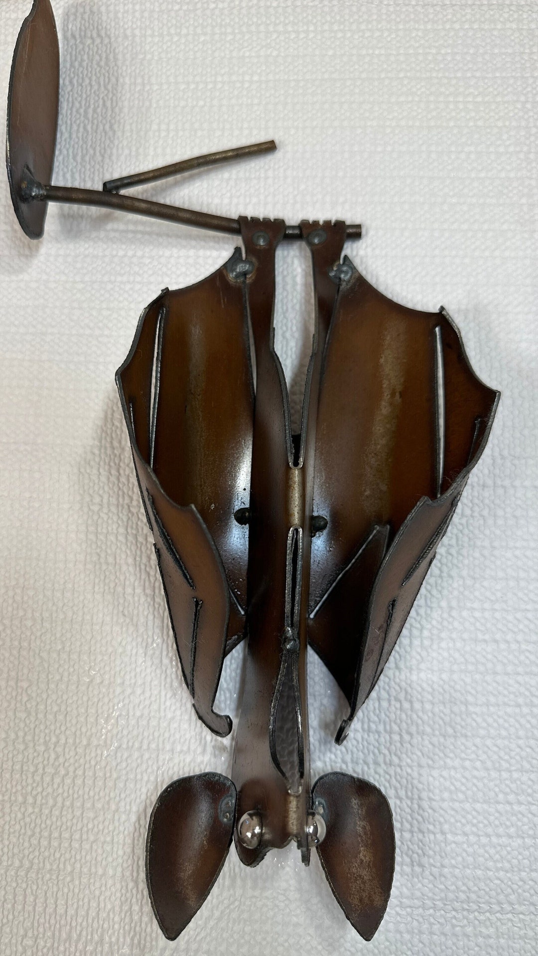 Metal Bat Hanging From a Limb Hand Made From Metal and Look at Those ...