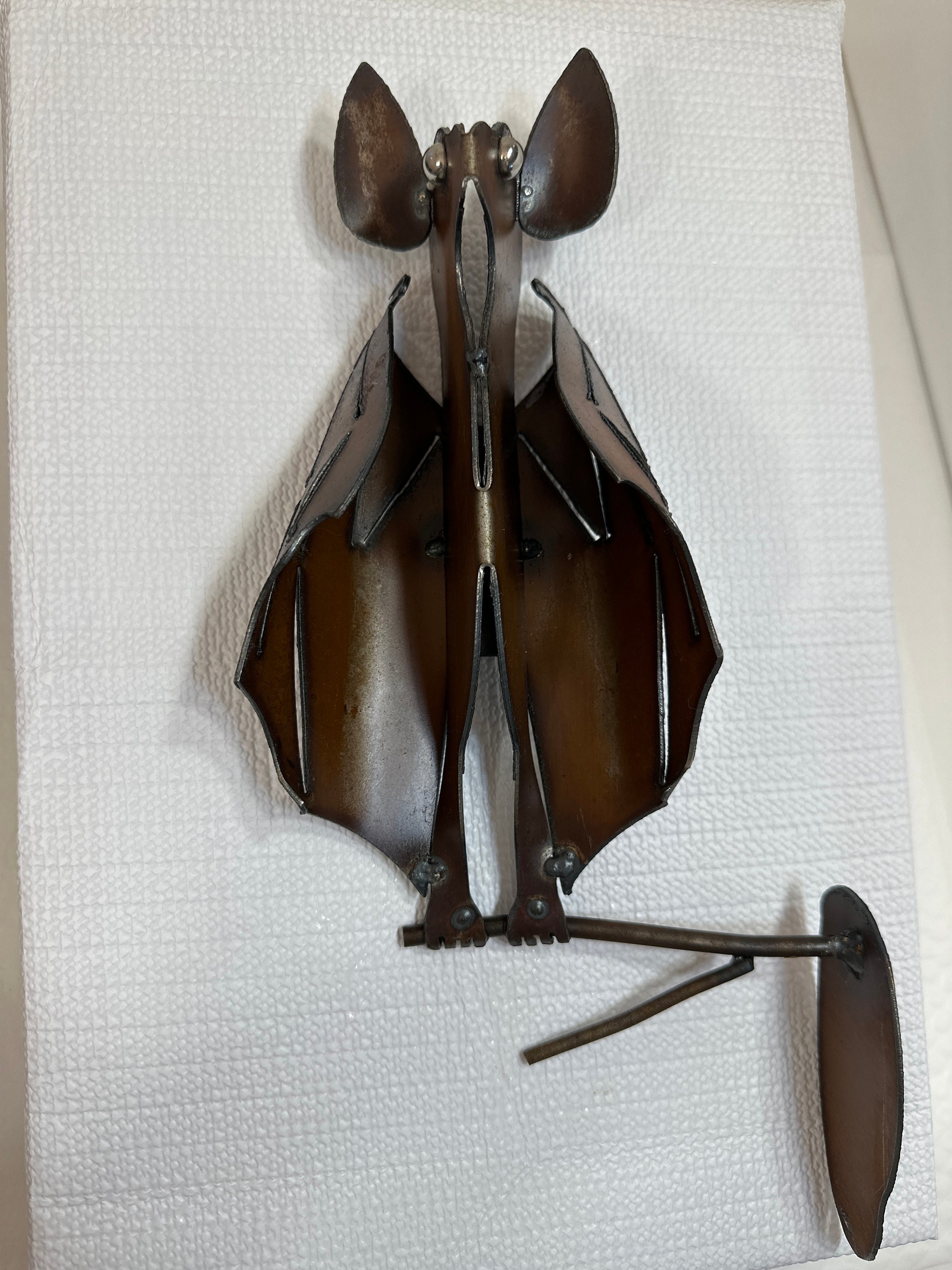 Metal Bat Hanging From a Limb Hand Made From Metal and Look at Those ...