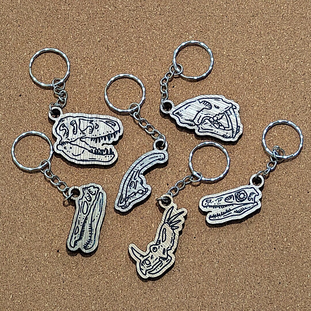 Dino Skull Keychains | T-rex, Baryonyx, Smilodon, Parasaur, Styracosaur ...