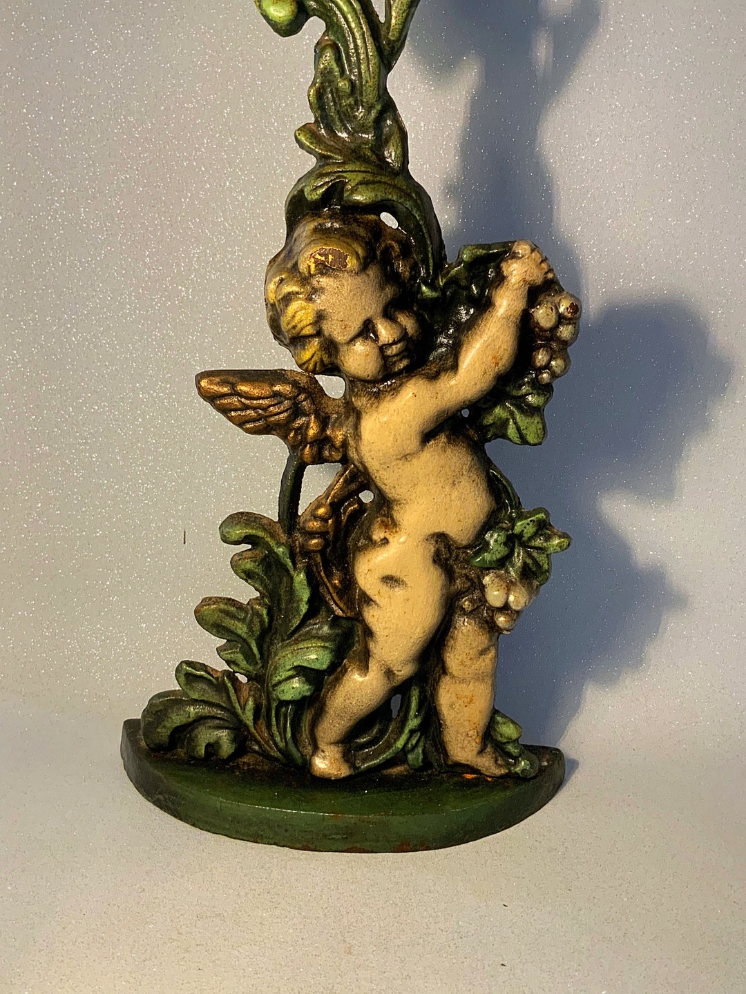 A Stunning Cast Puti Door Stop - Etsy