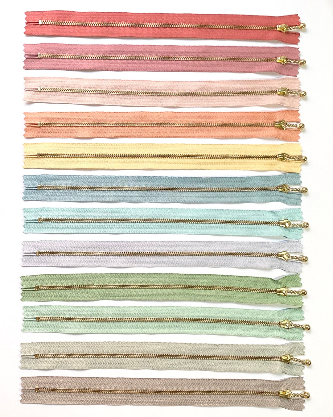 YKK Zips/zippers 25cm, Pastel Colour, Metallic Gold Coloured Ball ...