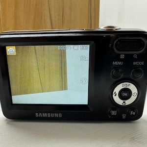 Samsung ES80 Digital Camera 12 MP 5X Optical Zoom 2.4 Inches LCD Video ...