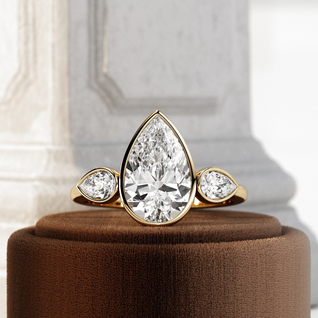 2 Carat E VVS2 Pear Cut Lab Created Diamond Bezel Set Three Stone Ring ...