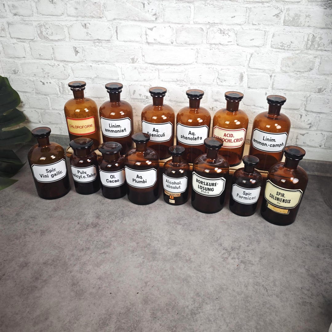 Apothekerfles geëmailleerd label selectie bruine antieke medicijnflessen Drankjes Academia ...