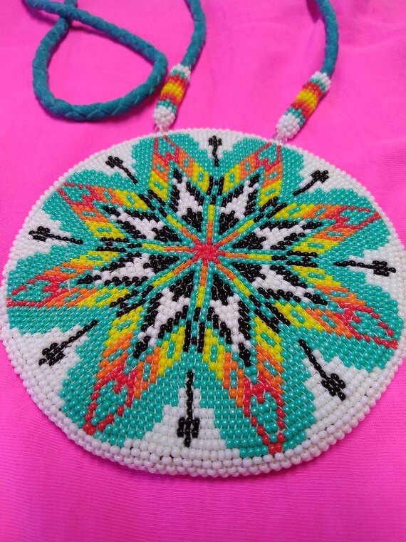 Traditional native American hand beaded rosette medallion - munimoro.gob.pe
