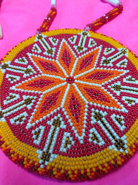 Traditional native American hand beaded rosette medallion - munimoro.gob.pe