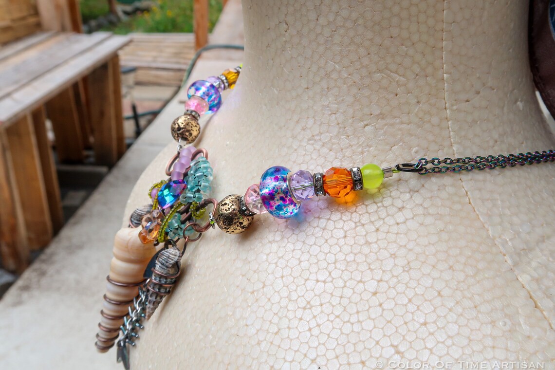 Sunken Treasures Spiral Seashell Fish Bones Mingled With Glass Necklace ...
