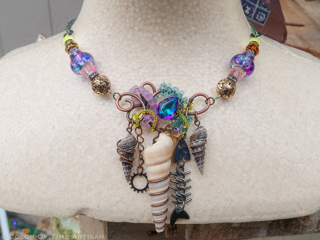 Sunken Treasures Spiral Seashell Fish Bones Mingled With Glass Necklace ...