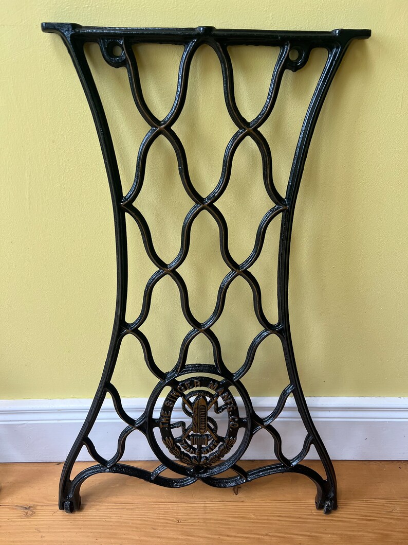 A Beautifully Restored and Highlighted Pair of Vintage Singer Sewing ...