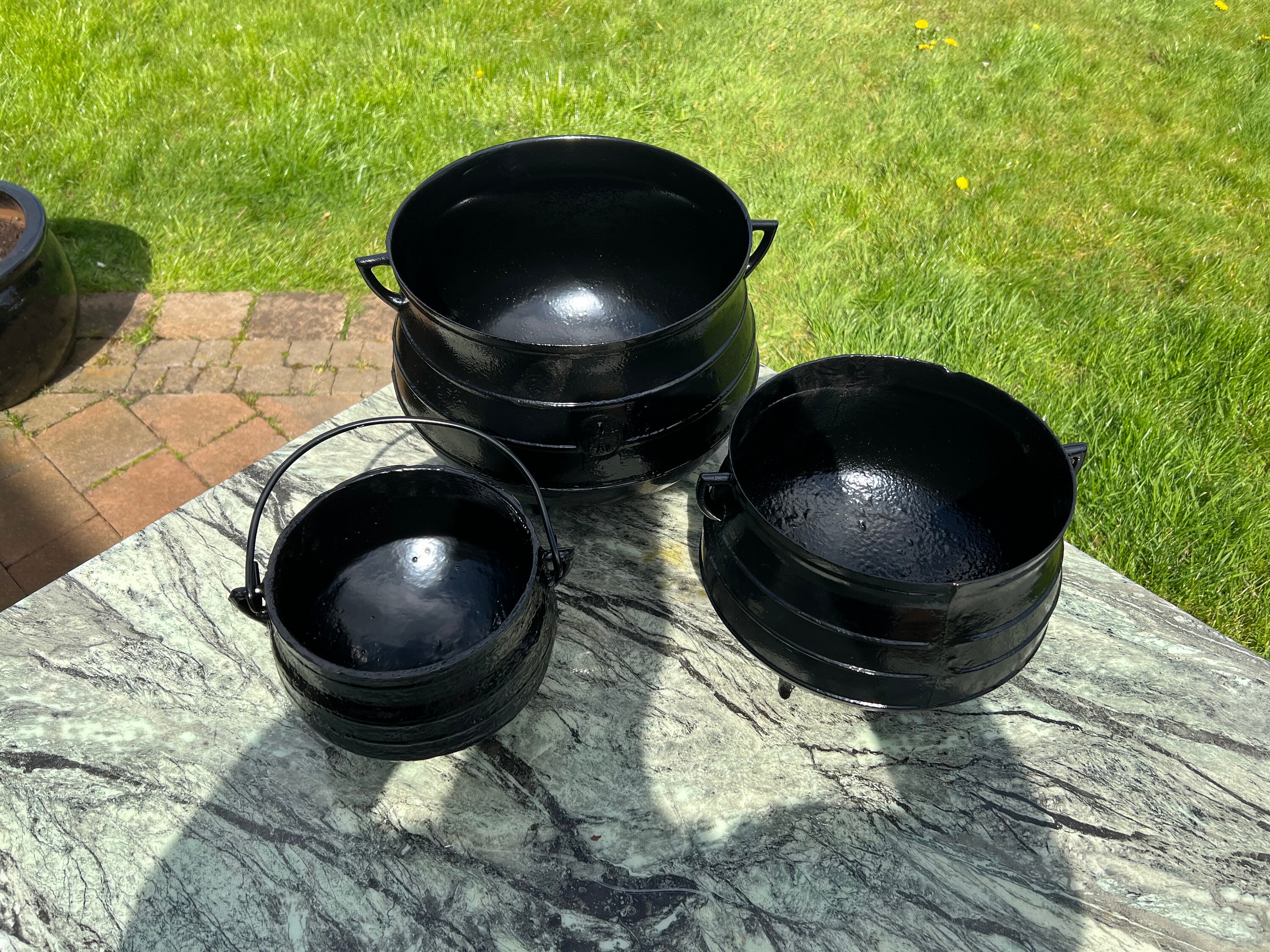 Three Matching Antique Cast Iron Three Legged 'pixie Ear' Handled ...