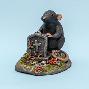 Dumbo Rat on Cemetery. Tombstone Red Flowers Skulls on Rock. Colorful ...