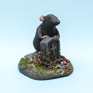 Dumbo Rat on Cemetery. Tombstone Red Flowers Skulls on Rock. Colorful ...