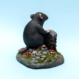 Dumbo Rat on Cemetery. Tombstone Red Flowers Skulls on Rock. Colorful ...