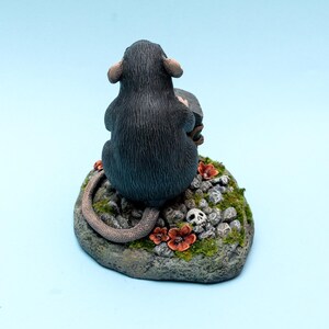 Dumbo Rat on Cemetery. Tombstone Red Flowers Skulls on Rock. Colorful ...