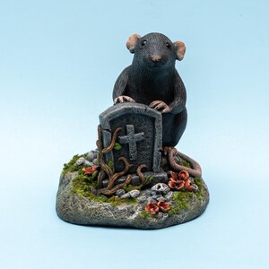 Dumbo Rat on Cemetery. Tombstone Red Flowers Skulls on Rock. Colorful ...