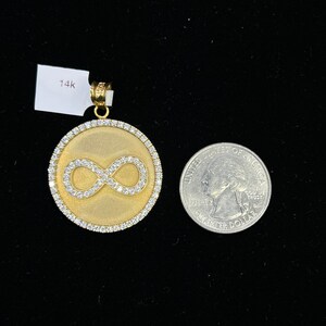 14k Yellow Gold Round Shaped With Diamond Infinity Sing in the Center ...
