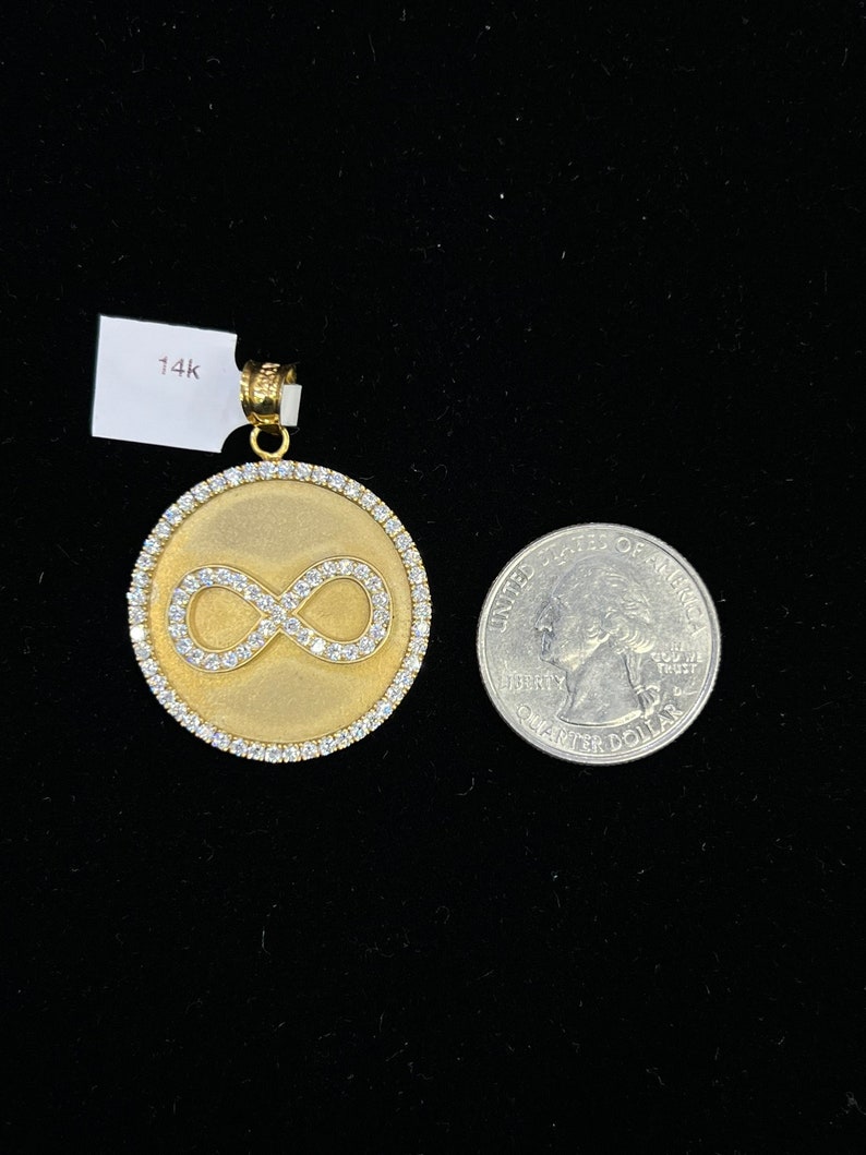 14k Yellow Gold Round Shaped With Diamond Infinity Sing in the Center ...