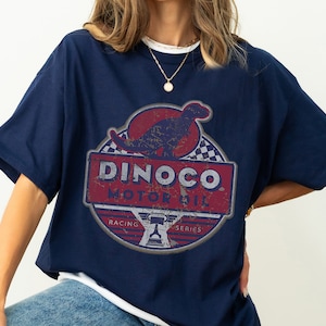 Disney Pixar Cars Dinoco Motor Oil Faded Sign T-shirt, Magic Kingdom ...