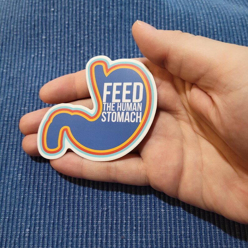 FEED the HUMAN STOMACH Sticker - Etsy