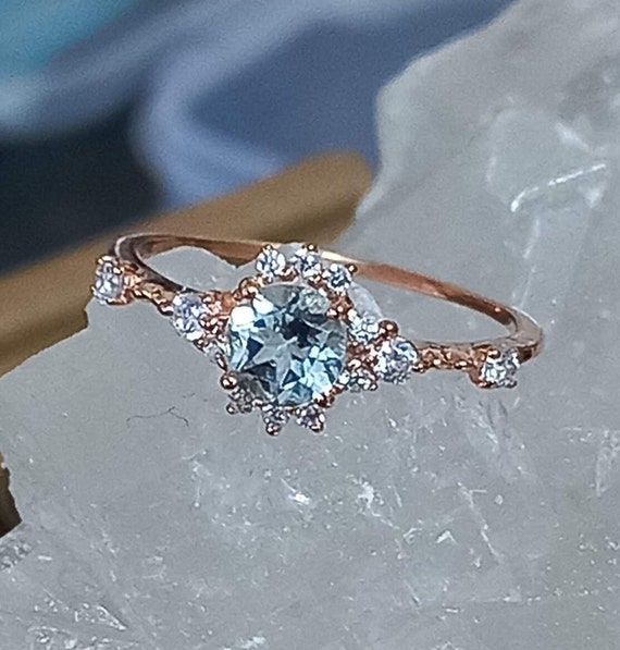 Aquamarine promise rings for her store