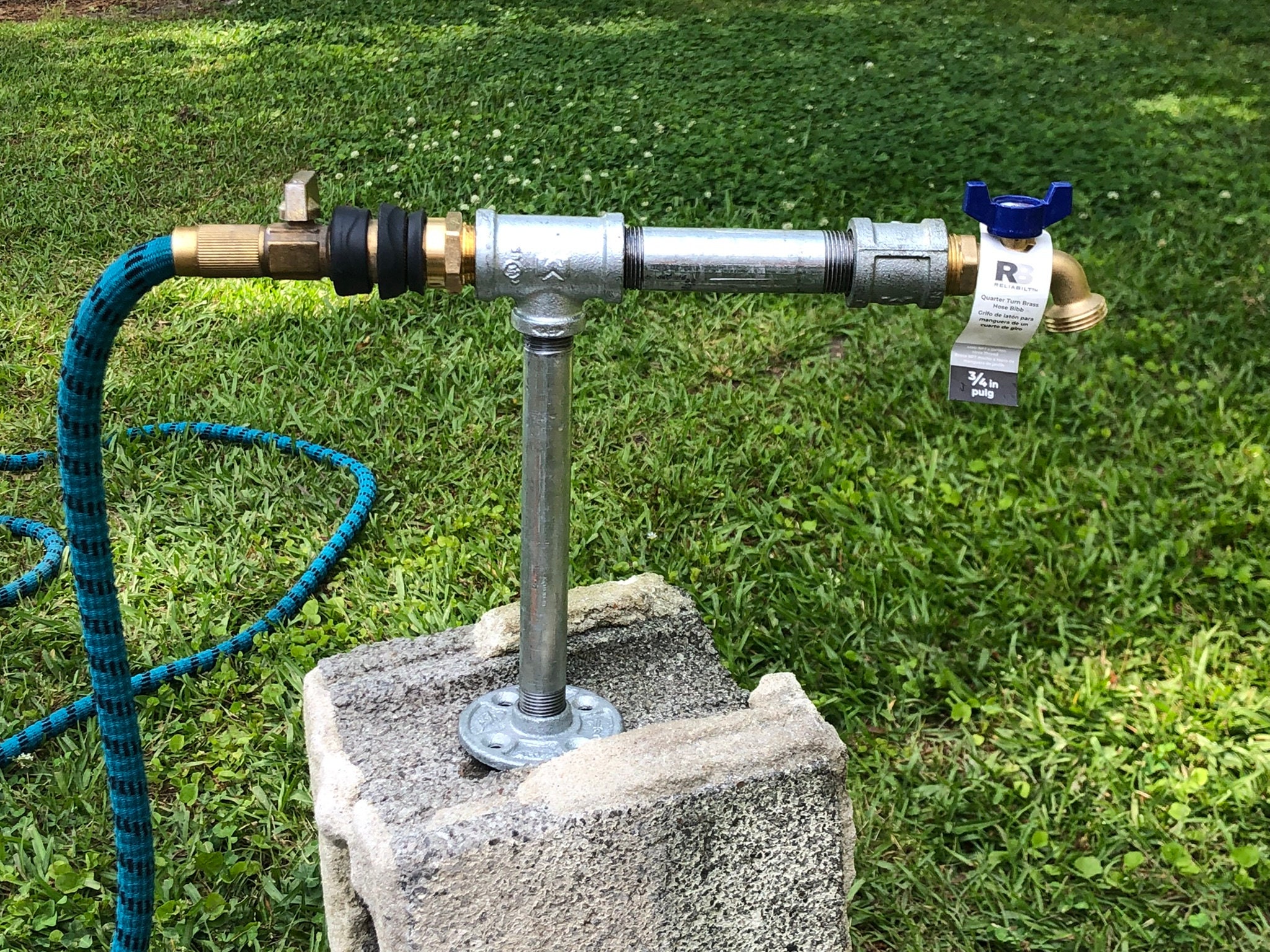 Outdoor Faucet attaches to a garden hose galvanized iron pipe
