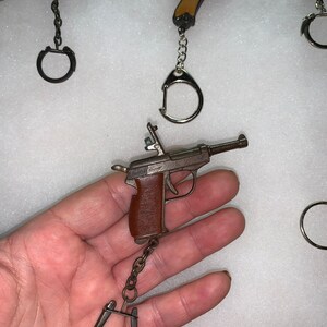 Vintage 1950’s-1980’s-collection of NINE Cap Gun Key Chains in Shadow ...