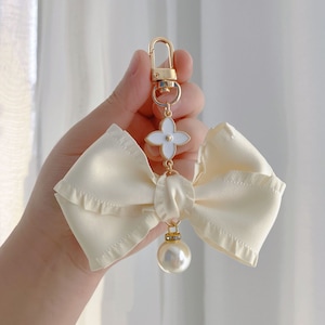 Beautiful Gentle Purple Bow Pearl Keychain Charm Heart-shaped Key Chain ...