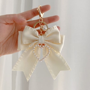 Beautiful Gentle Purple Bow Pearl Keychain Charm Heart-shaped Key Chain ...