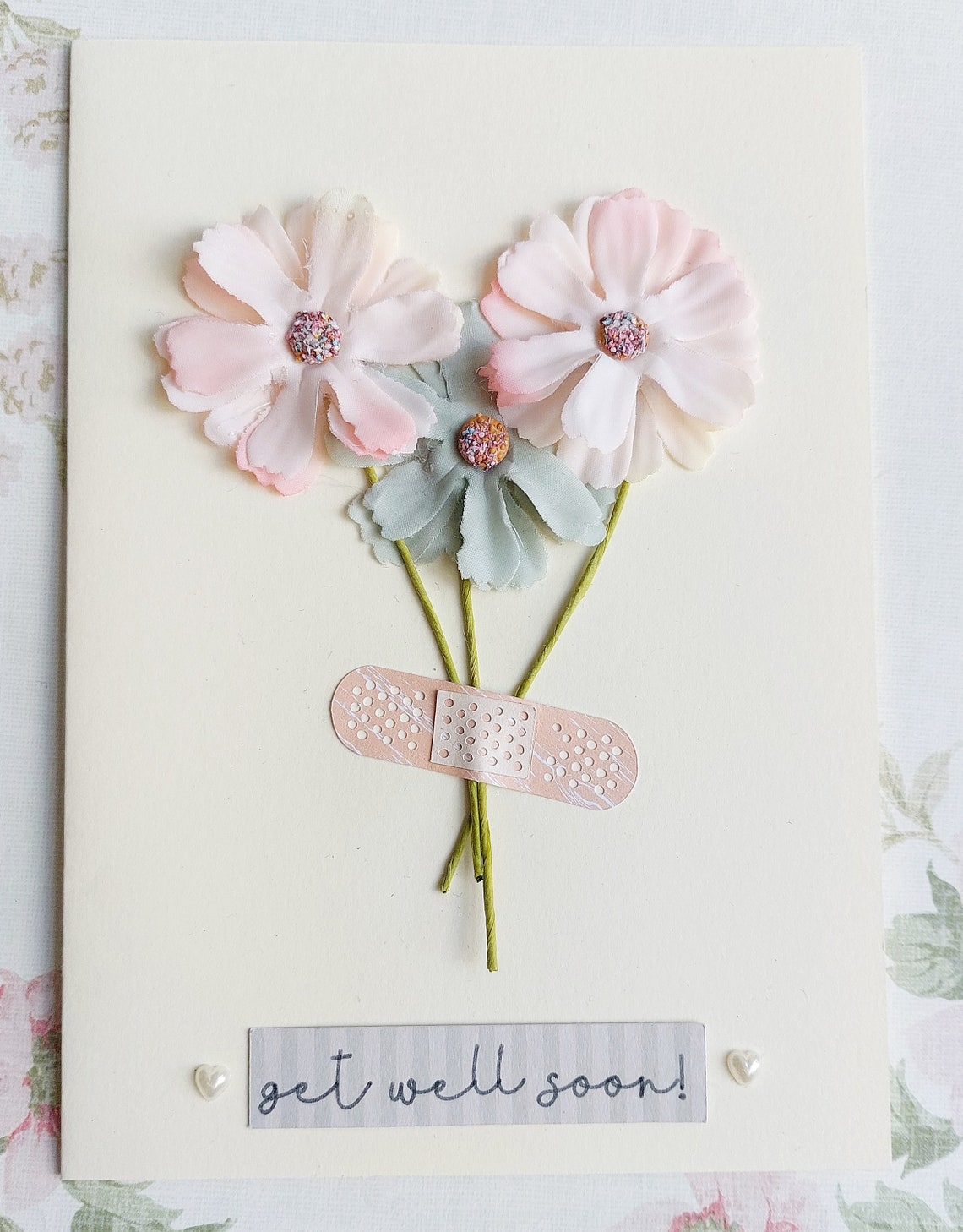Unique Get Well Soon Card. Flowers and a Plaster or Band Aid. Feeling ...