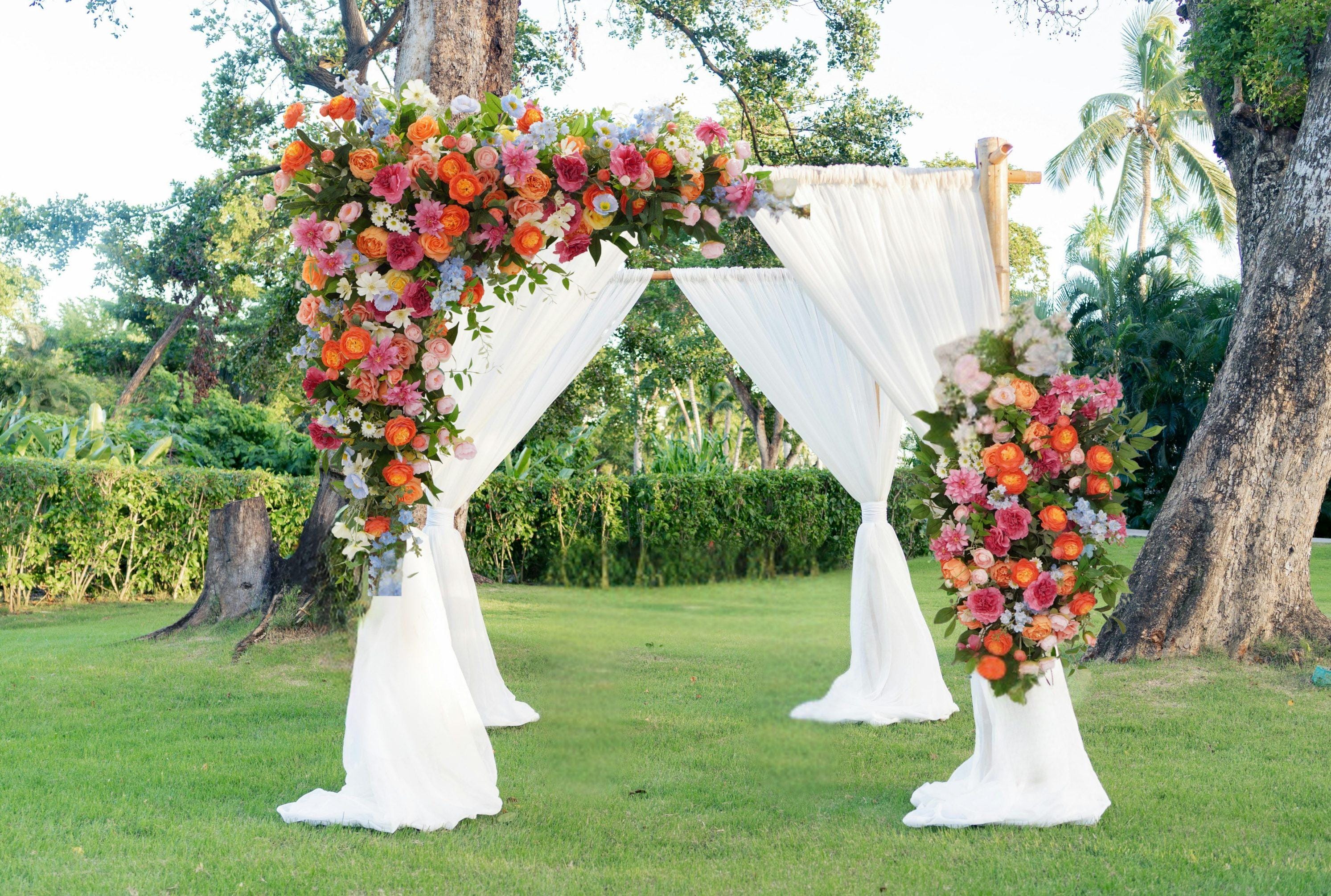 Vibrant Pink and Orange Wedding Arch Floral Decoration With Garden ...