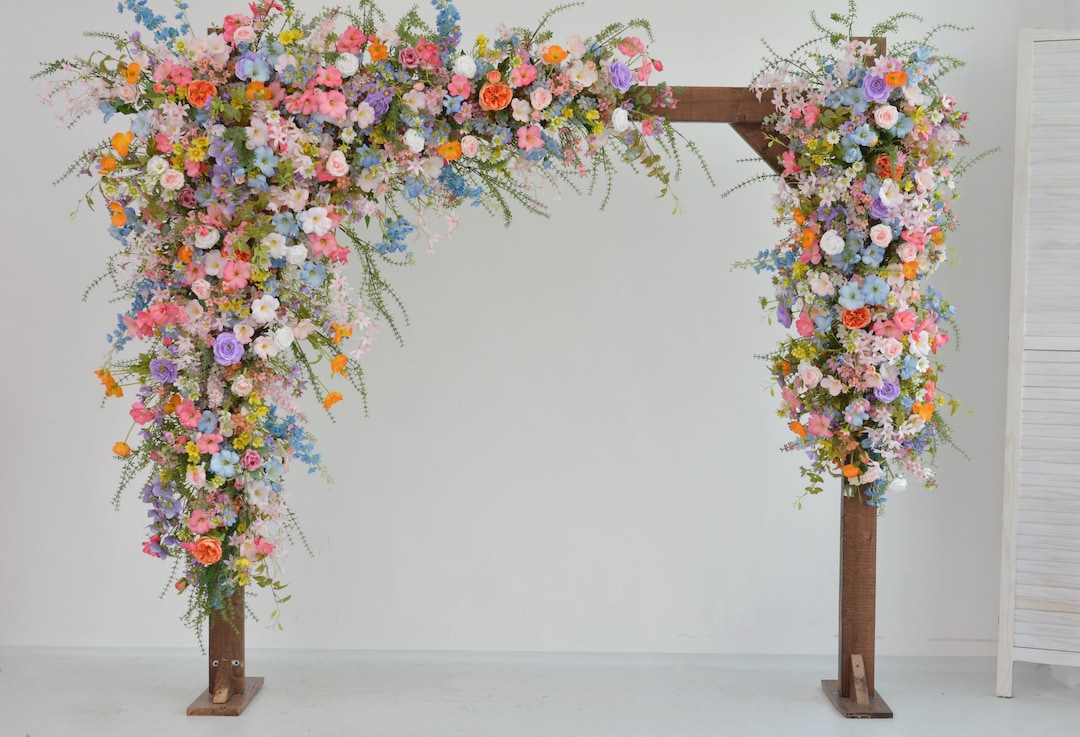 Pastel Wildflower Wedding Arbor Arrangements With Light Pink, Orange ...