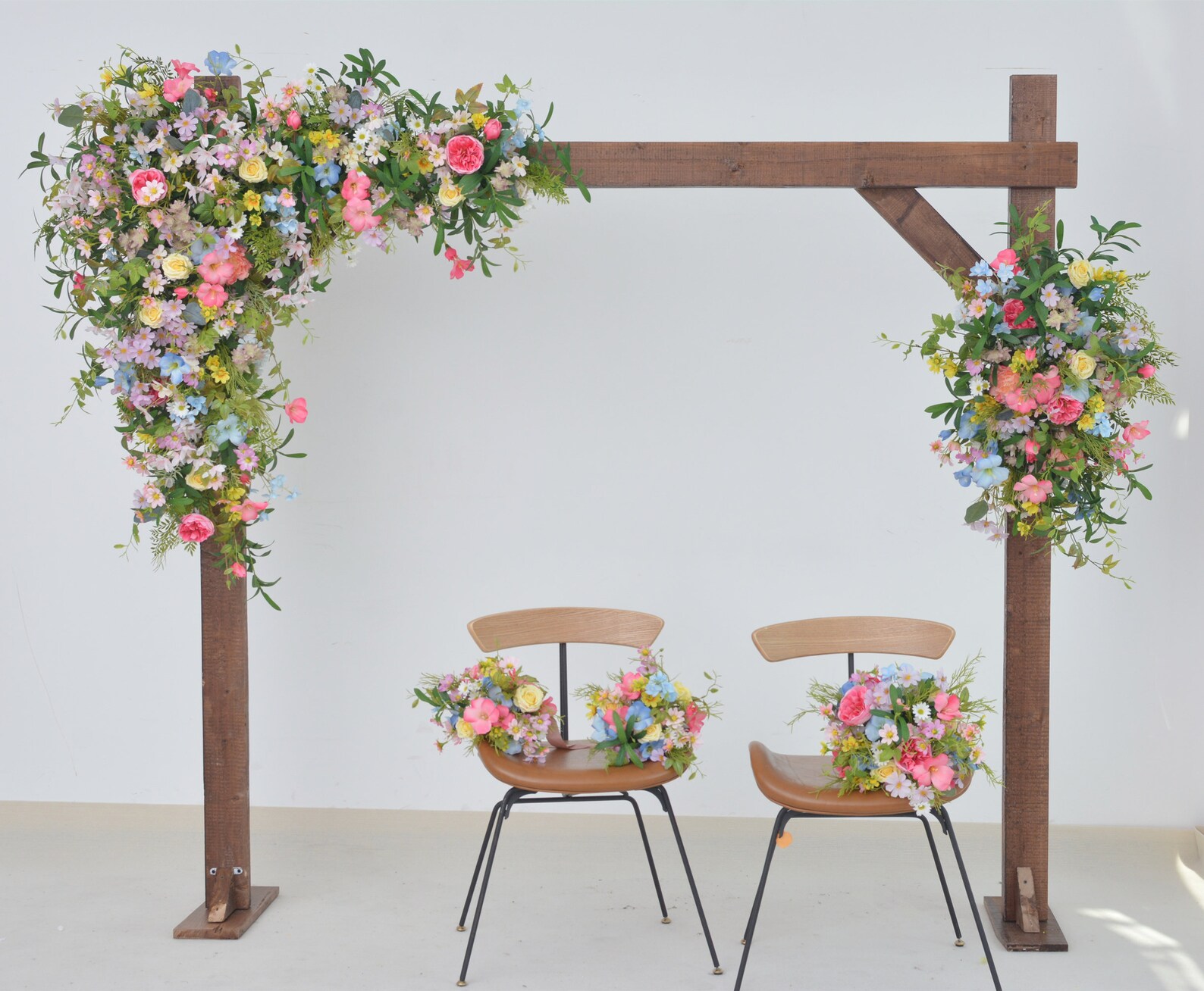Wildflower Themed Wedding Arch Arrangements in Pink, Mauve, Blue and ...