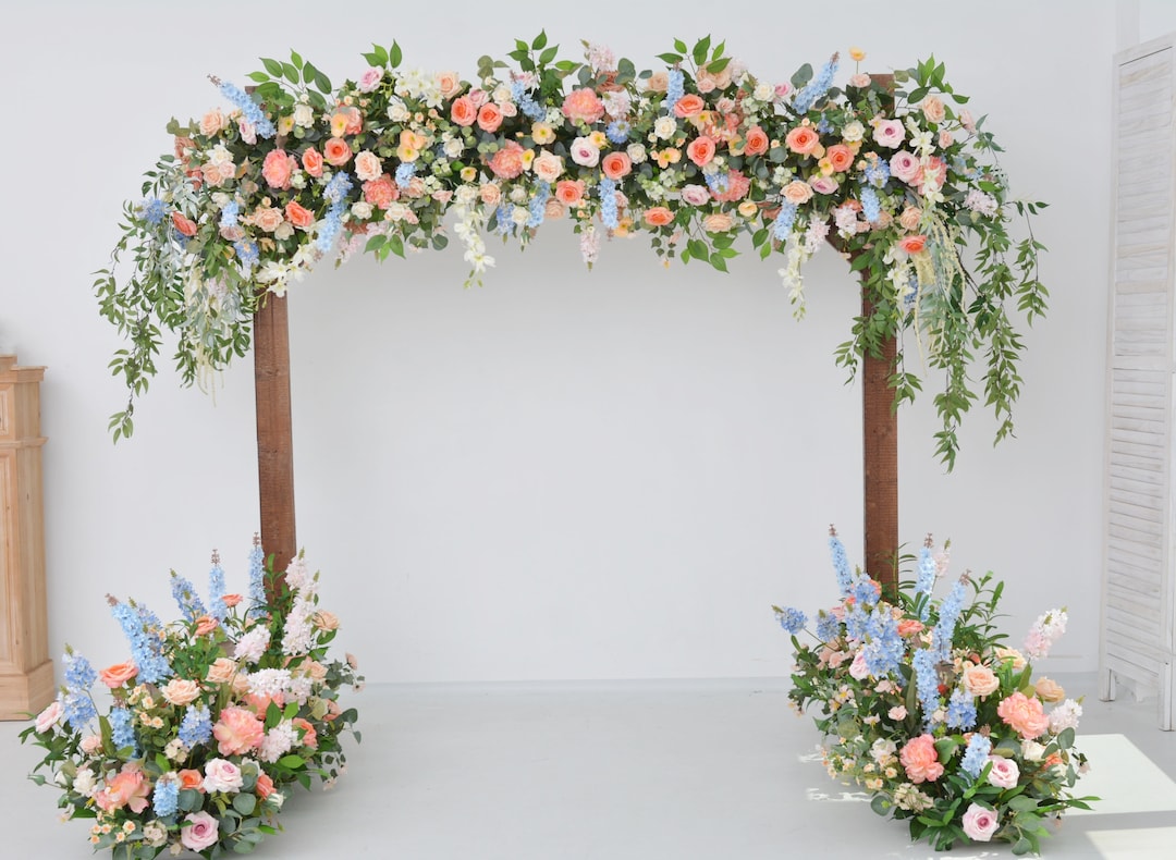 Pastel Peach, Blue, and White Floral Wedding Arbor With Coordinating ...