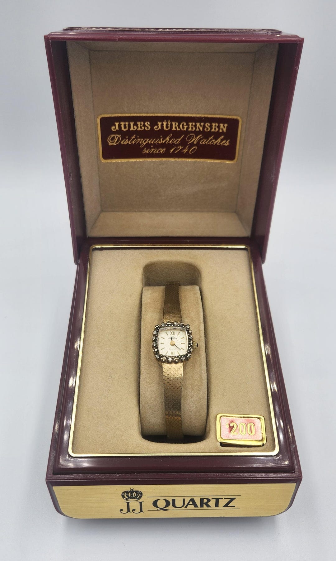 Jules Jurgensen Ladies Gold Toned Diamond Accented Quartz Watch With ...