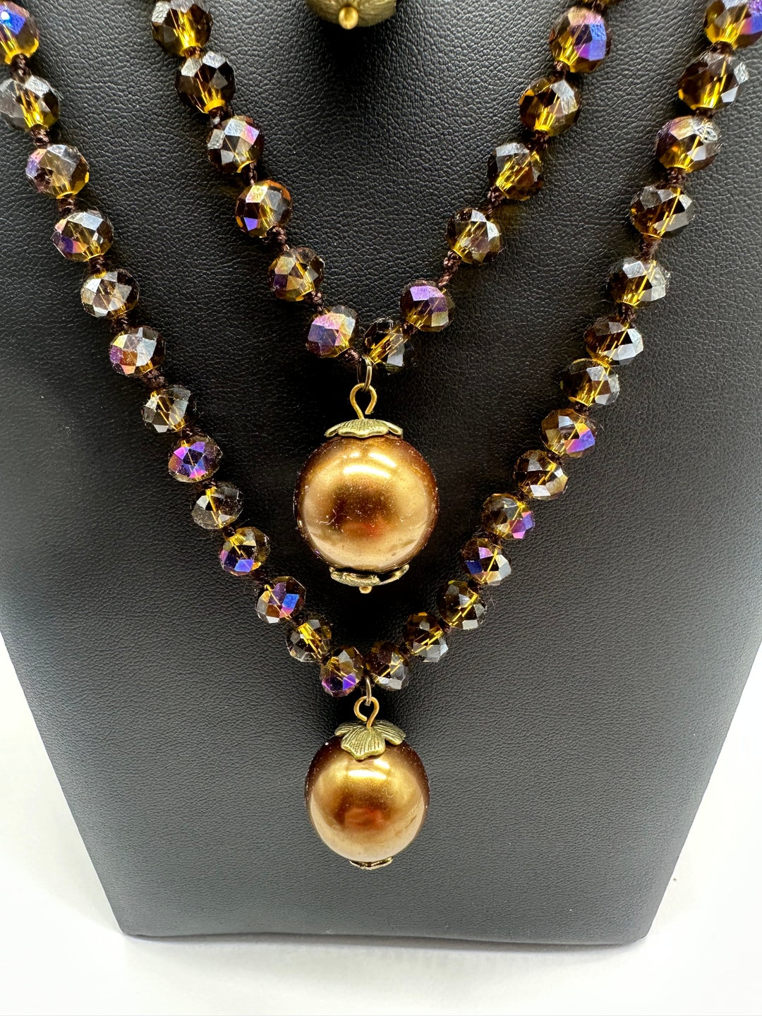 Multi Strand Necklace With Crystals and a Beautiful Rhinestone Pendant ...