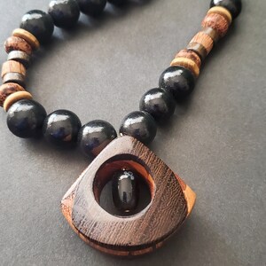 Reversible Handcarved Hardwood Pendant, Palm & Wood Necklace - Etsy