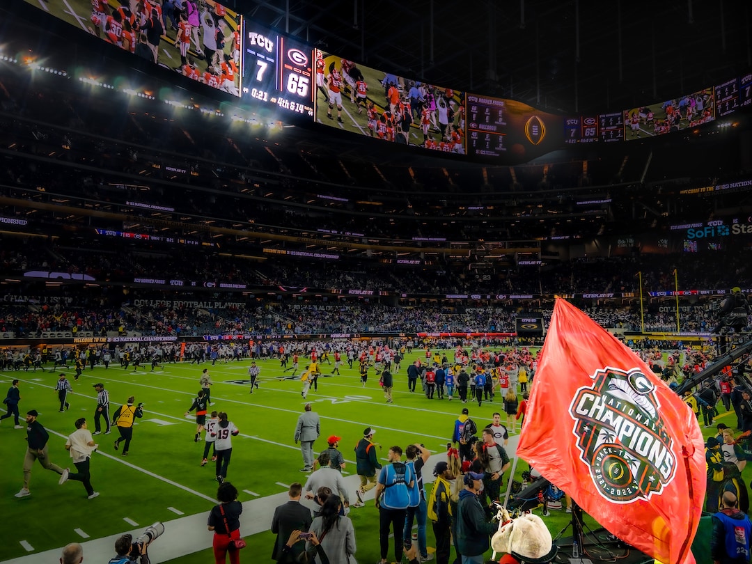 2023 UGA National Champions - Hairy Dawg With Natty Flag as Game Ends ...