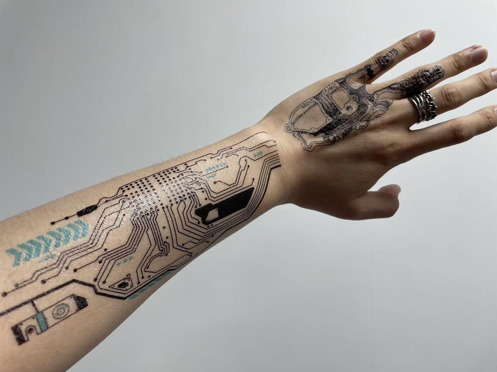 Cyberpunk hand tattoo - Bronctattooaus.com