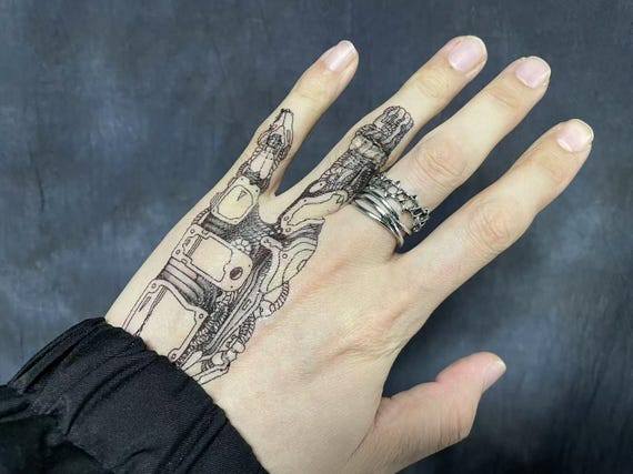 Cyberpunk hand tattoo | Orangetattooshop.com