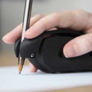 Assistive Writing and Drawing Tool for Individuals With Limited ...