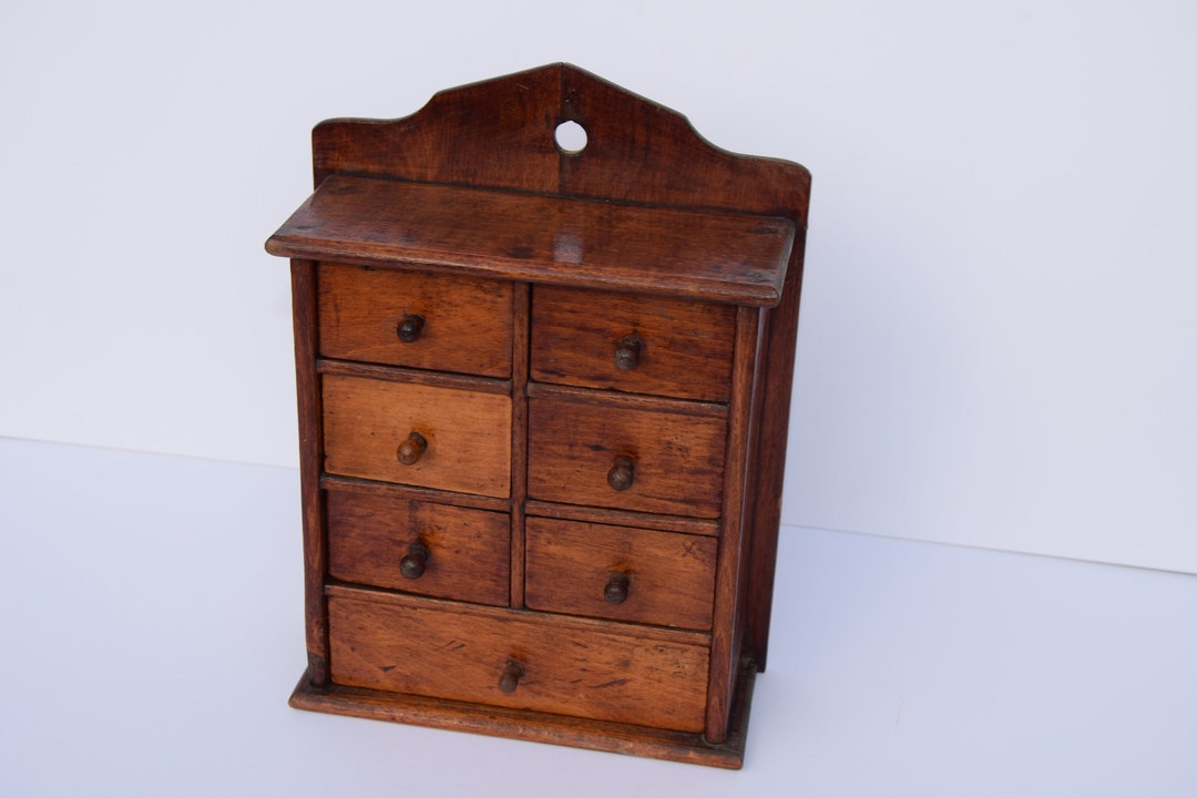 A Small Wooden Chest of 7 Drawers, a Genuine Apprentice Piece, a Rare ...
