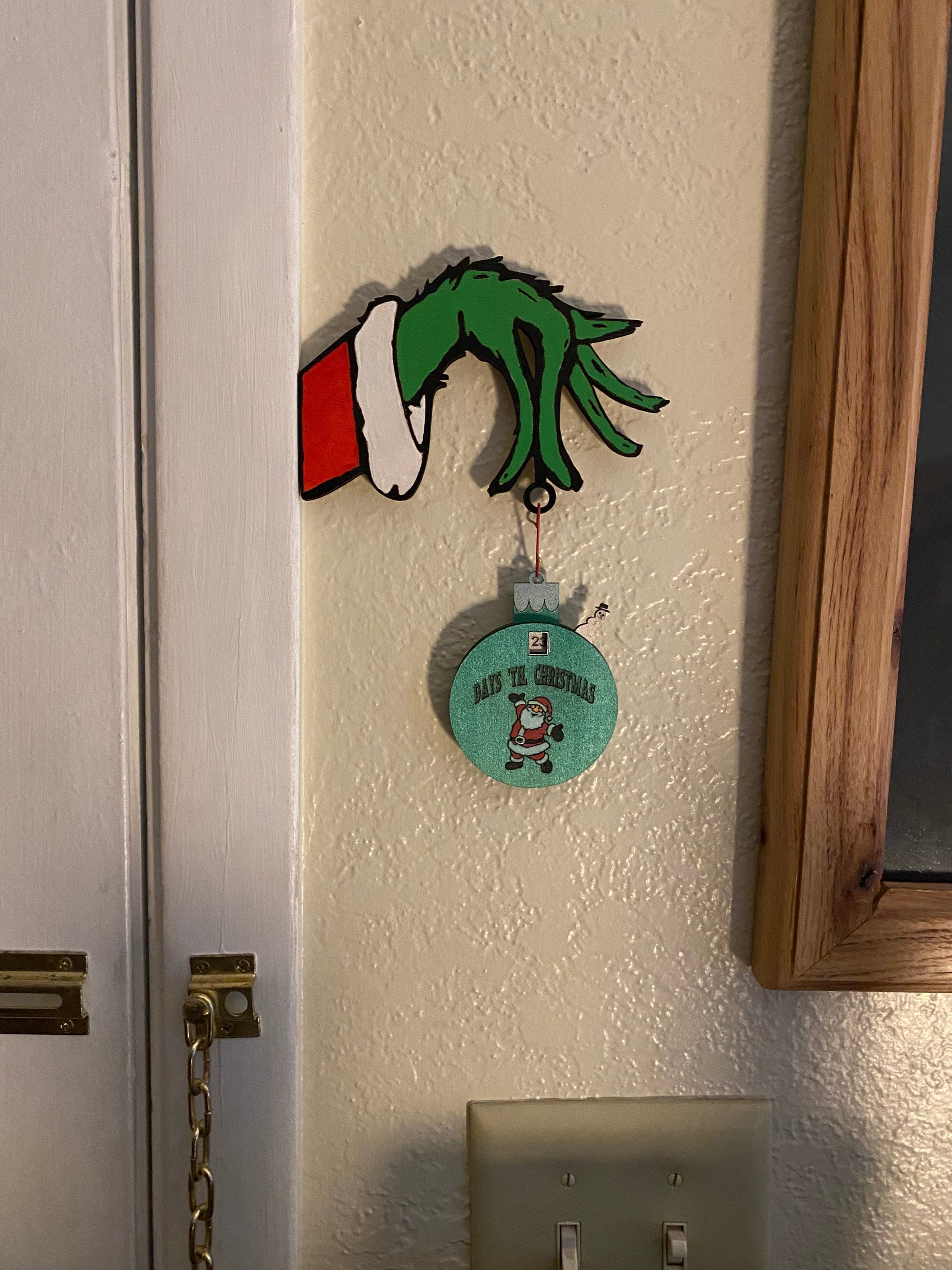 How the Grinch Stole Christmas Grinchs Hand Holding an Ornament Hanging ...